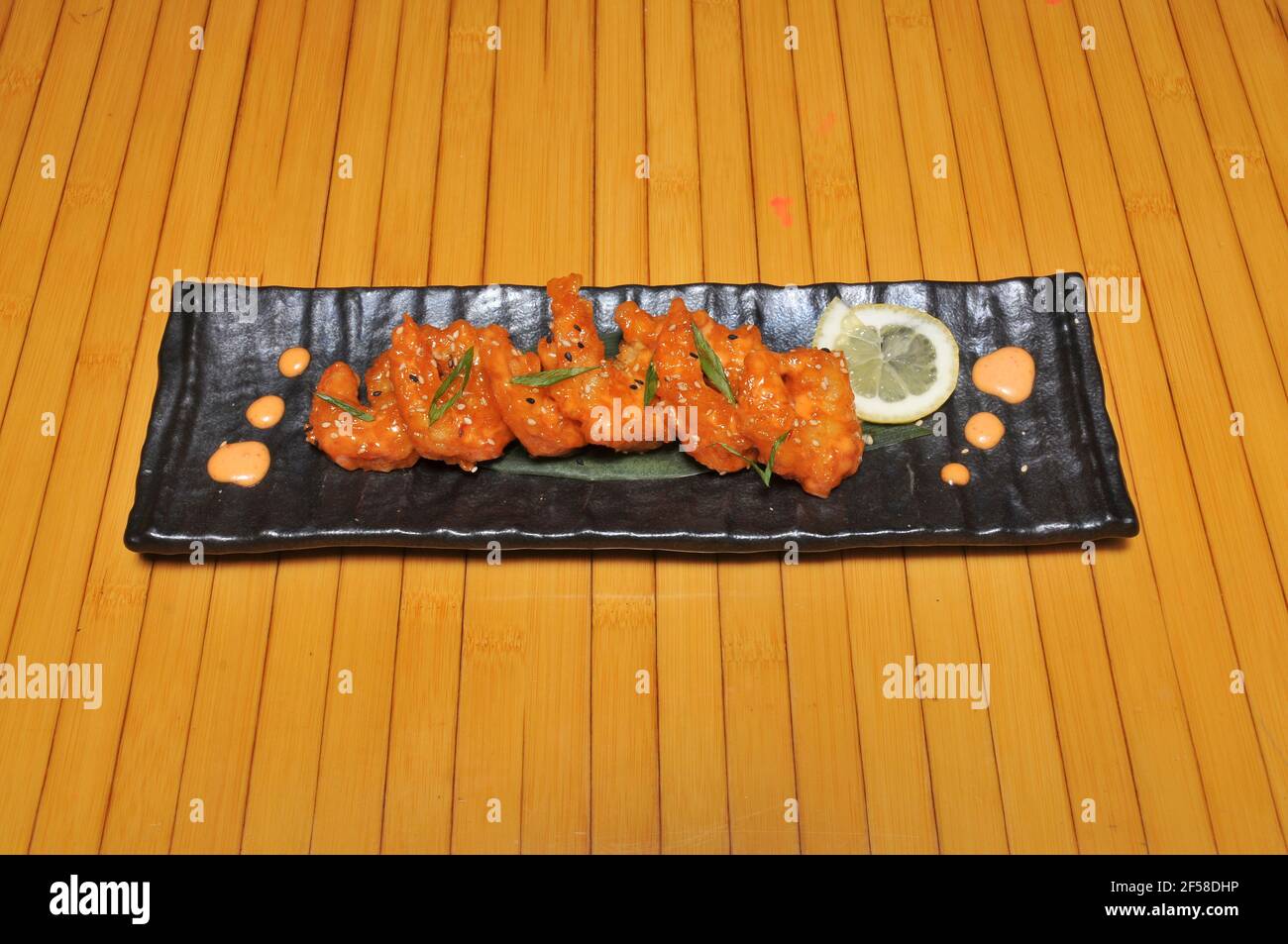 Delicious Japanese food known as volcano shrimp Stock Photo - Alamy