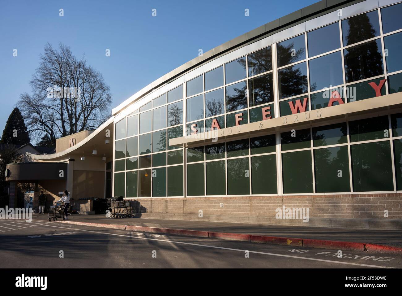Masked shoppers outside of the Safeway grocery store in Lake Oswego ...