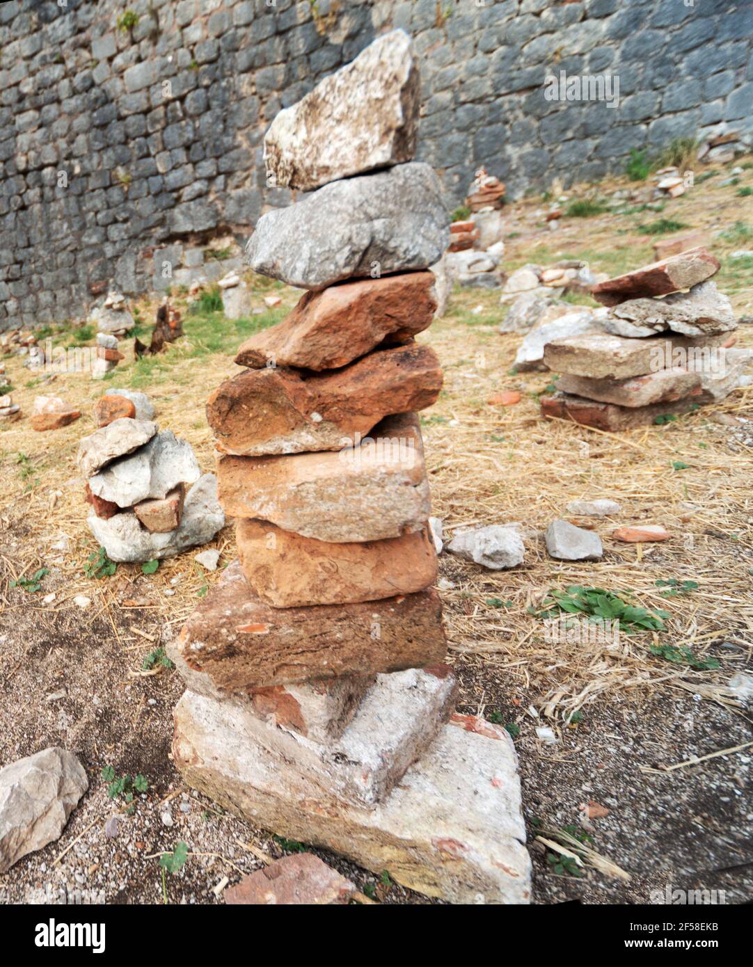 Small stacks os stones carefully stacked and arranged by people,placed ...