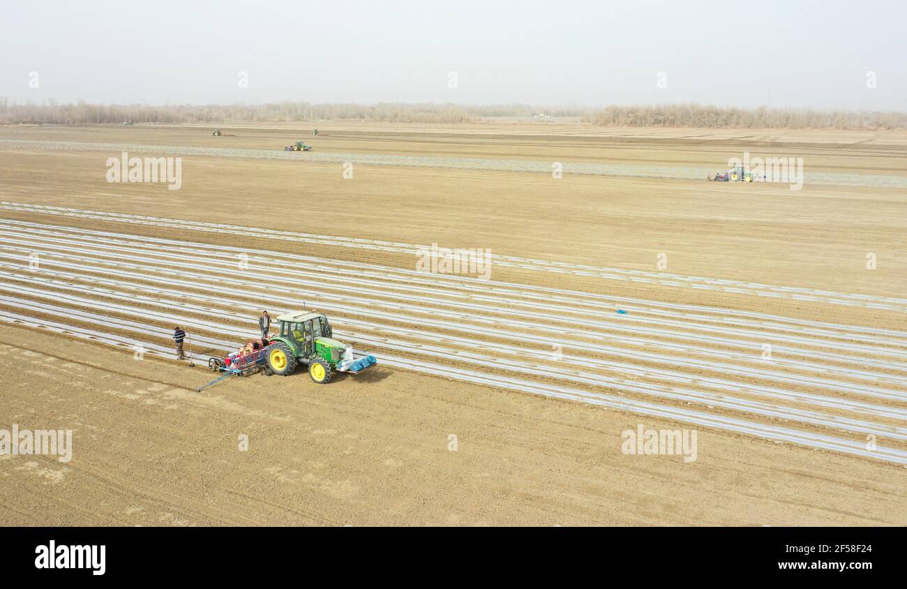 XINJIANG, CHINA - MARCH 24, 2021 - Seeders equipped with the Beidou ...