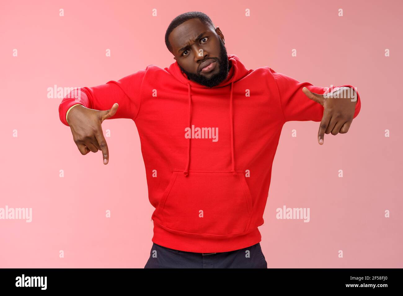 Cheeky stylish good-looking black bearded guy look cool tilting head ...