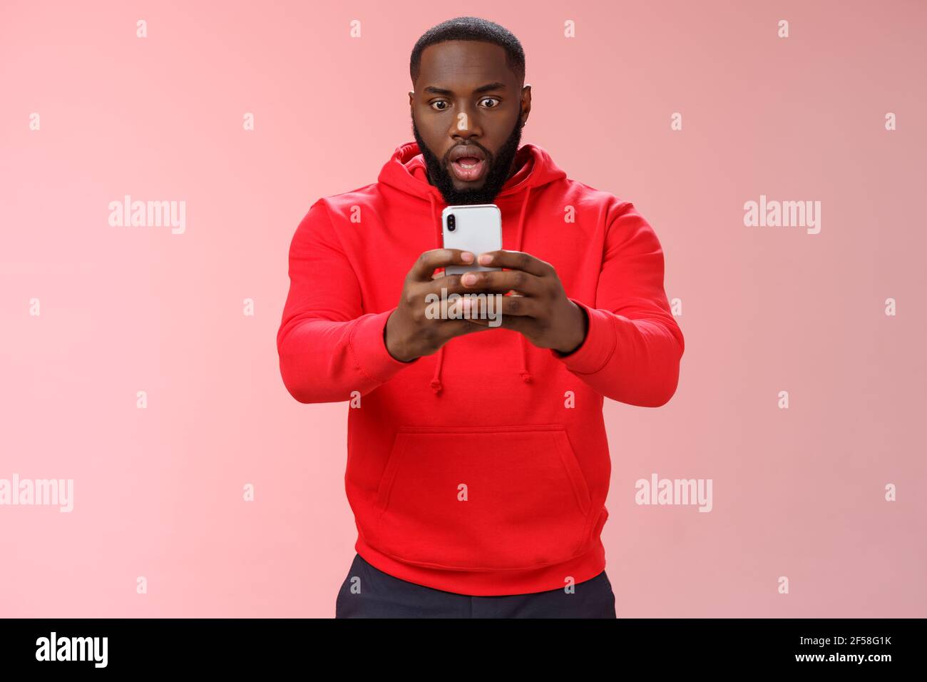 Wow hold on let take picture. Portrait impressed surprised shocked man ...