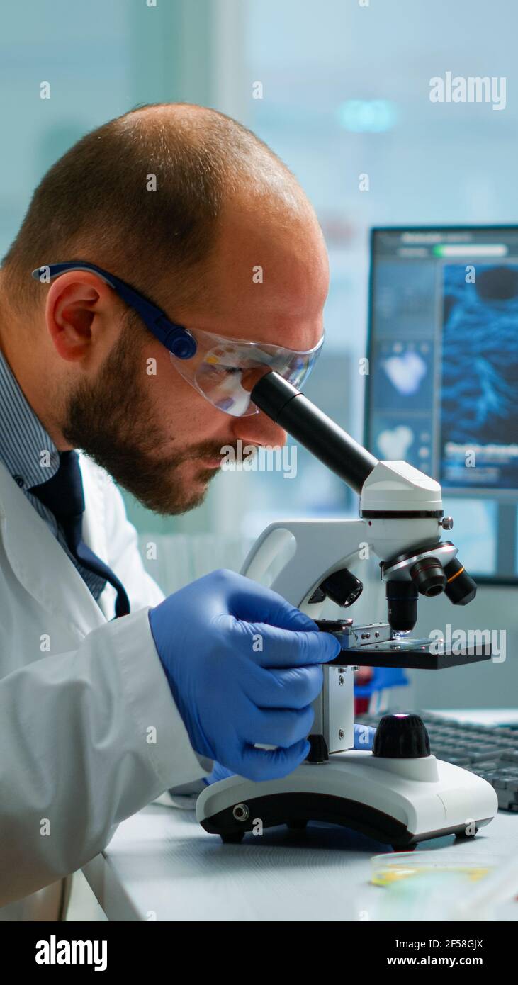 Male scientist analyzing lab environment hi-res stock photography and ...