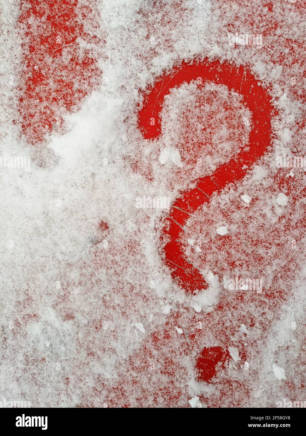 a red question mark on a snow-covered surface Stock Photo - Alamy