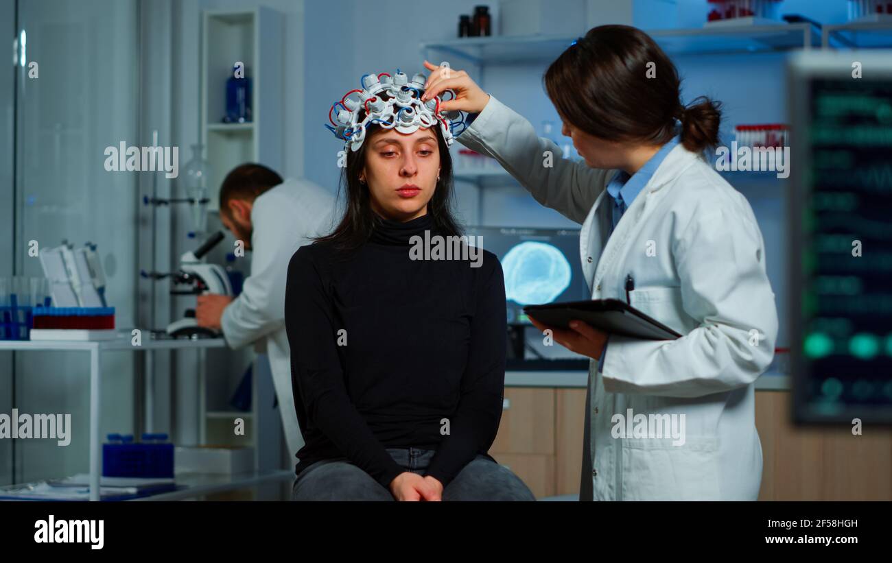 Professional doctor in neuroscience developing treatment for ...