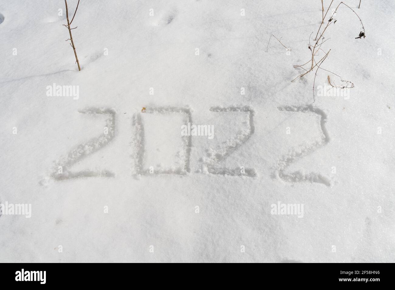 numbers 2022 in the snow. numbers 2022 in the snow. symbol of the new ...