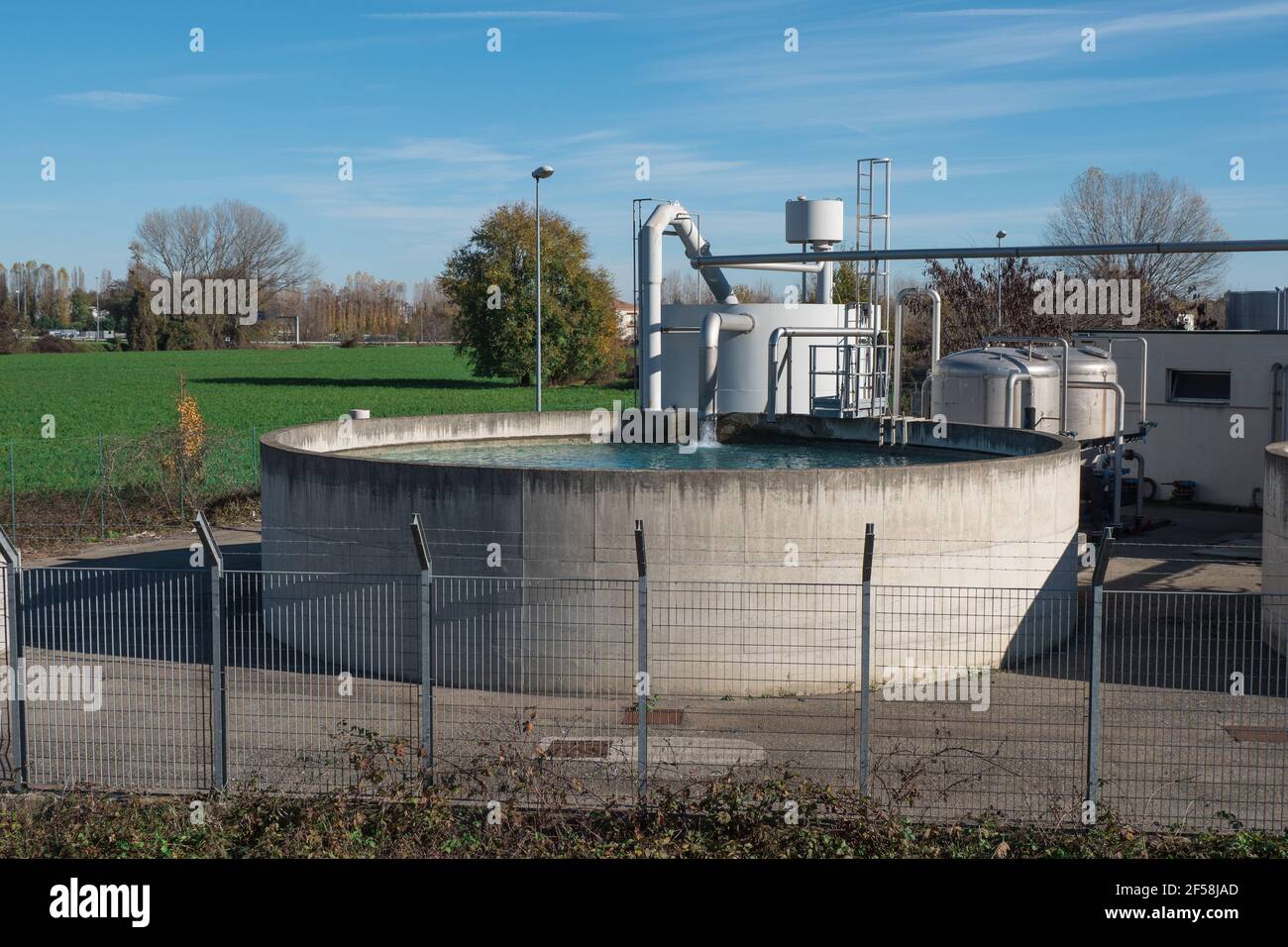 Large Circular Open-air Industrial Tank with Running Water Tap Stock ...