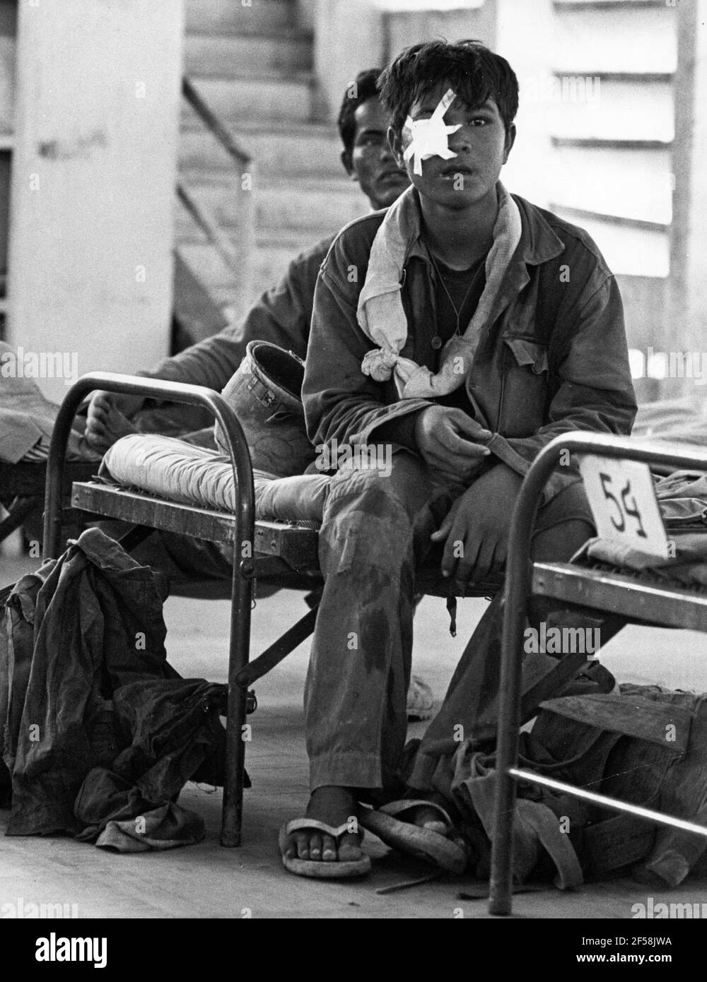 Phnom Penh 1975-04-14 The war is over for this junta soldier. Now he is ...