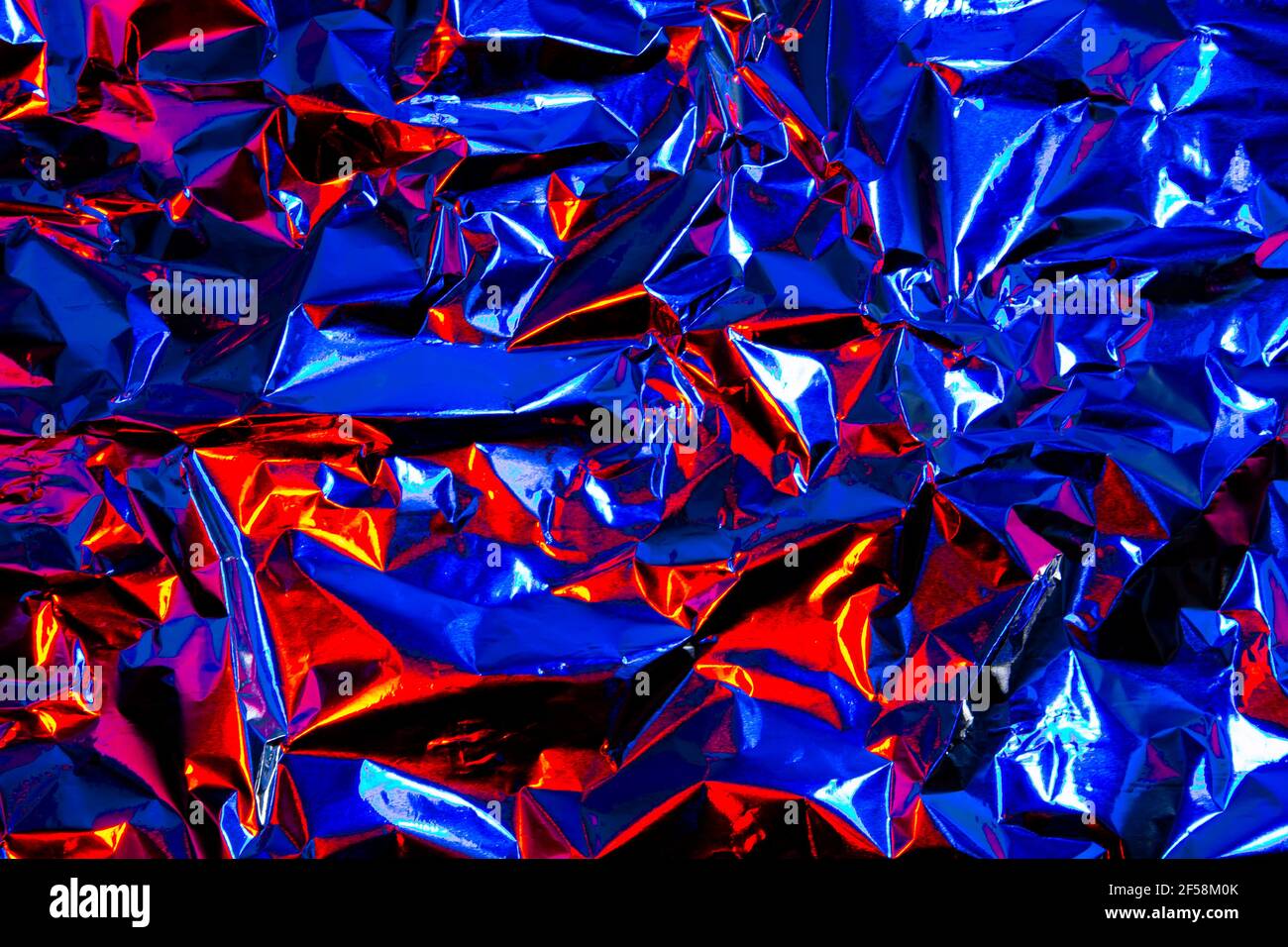 Abstract red and blue aluminum wrinkled foil background texture ...