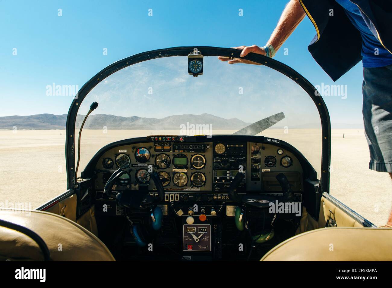 small aircraft dashboard interior view in the desert. High quality ...