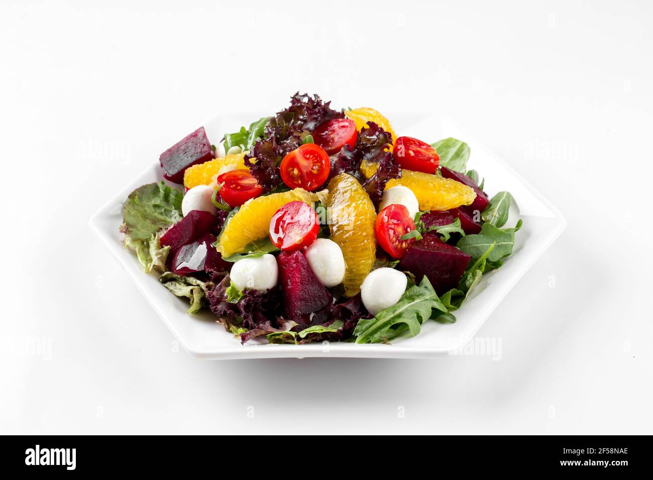 Isolated beetroot and mozzarella salad on white Stock Photo - Alamy