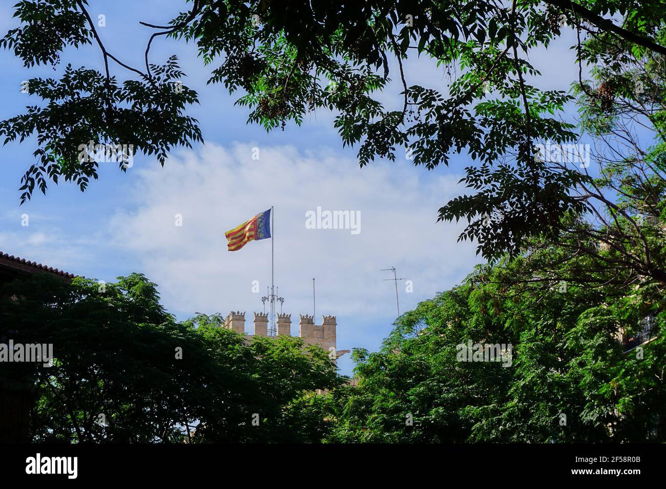 Spanish flag wawing on the top of La Lonja de la Seda in Valencia ...