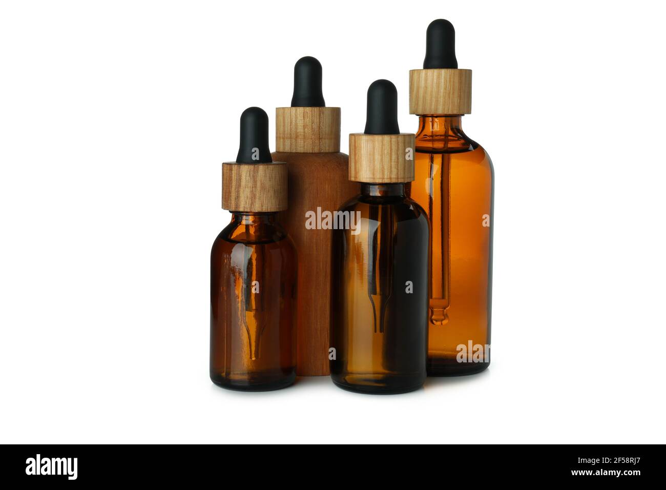 Dropper bottles with oil isolated on white background Stock Photo - Alamy