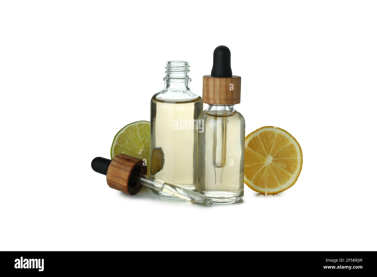 Dropper bottles with oil and citrus isolated on white background Stock ...