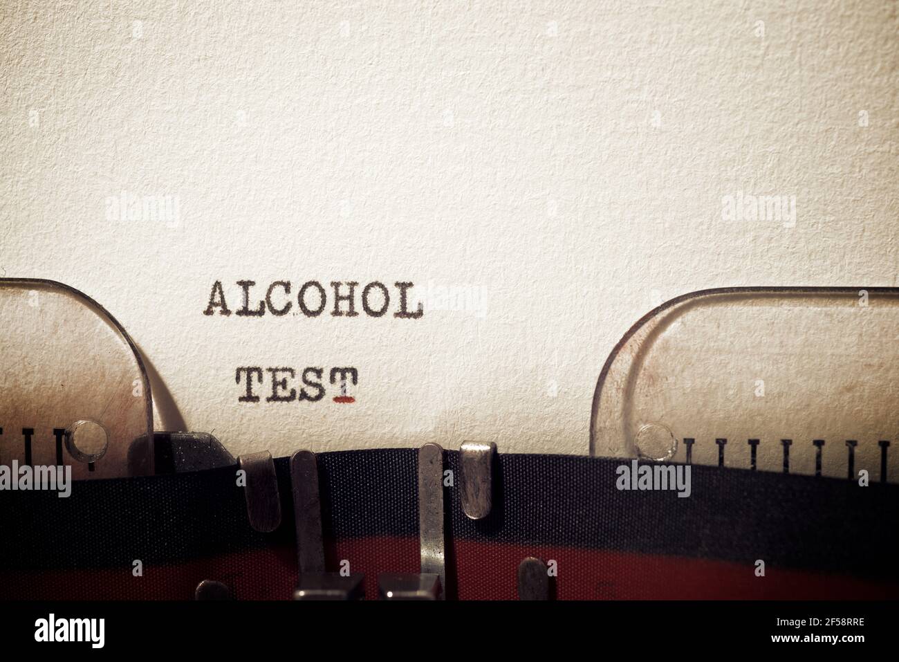 Alcohol test phrase written with a typewriter Stock Photo - Alamy