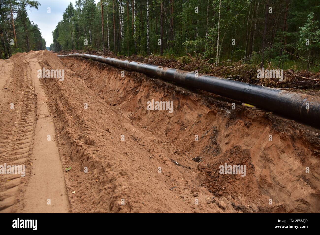 Trench in ground for laying pipeline of natural gas. Building of ...