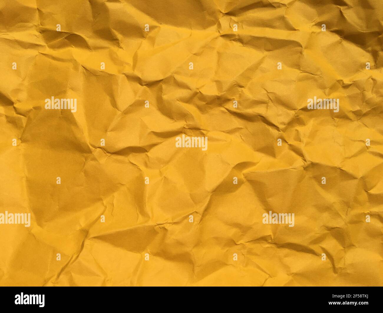 Abstract texture of yellow wrinkled paper background for Design. Copy ...