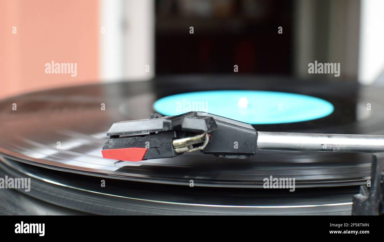 Vinyl record rotating Stock Photo - Alamy