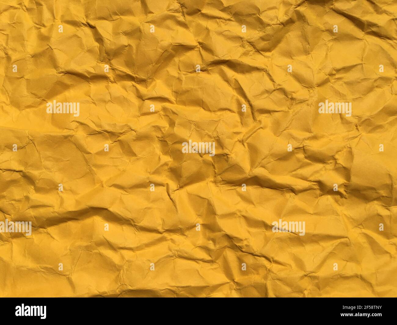 Abstract texture of yellow wrinkled paper background for Design. Copy ...
