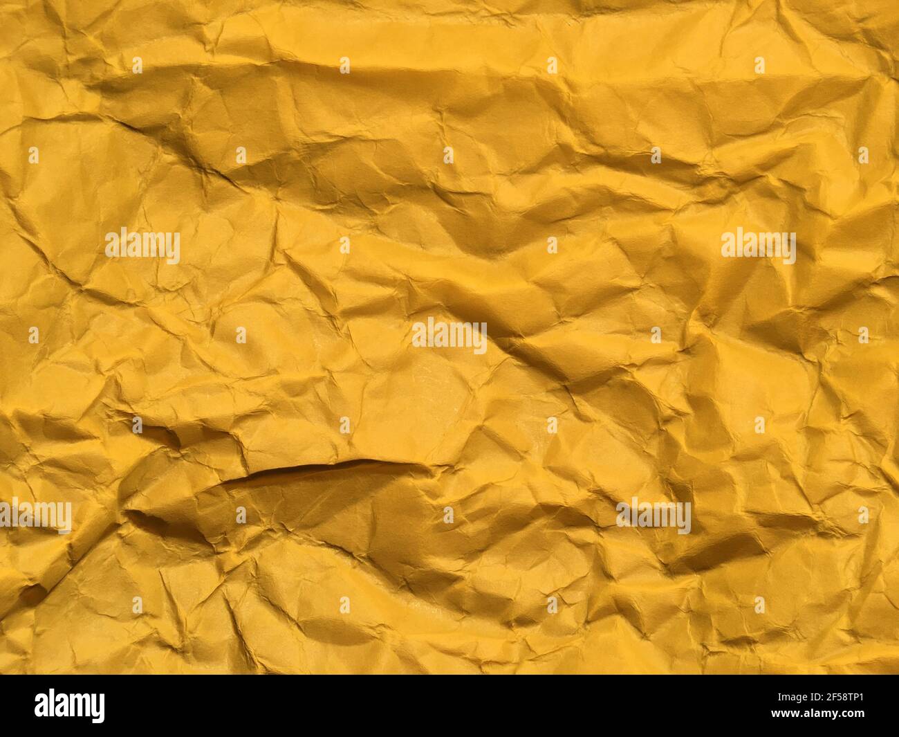 Abstract texture of yellow wrinkled paper background for Design. Copy ...