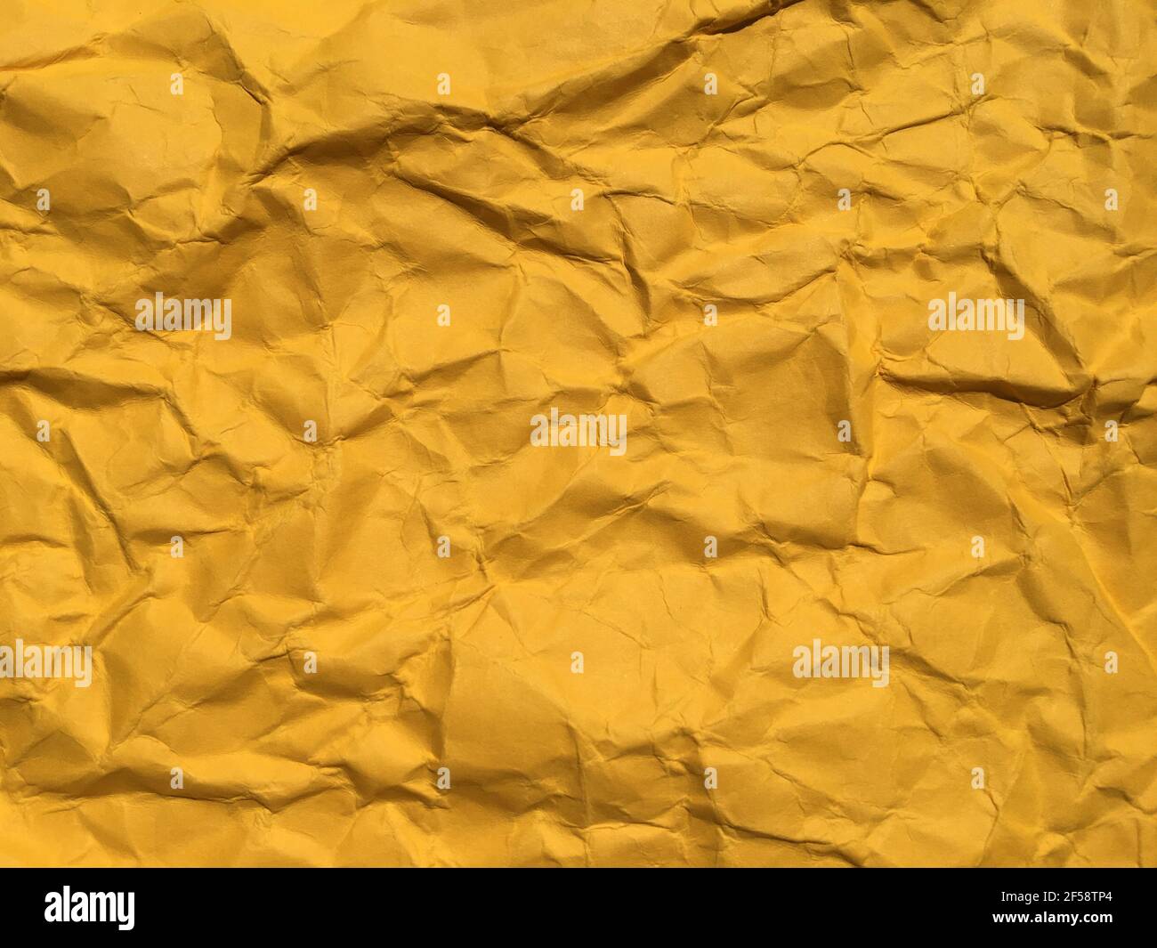 Abstract texture of yellow wrinkled paper background for Design. Copy ...