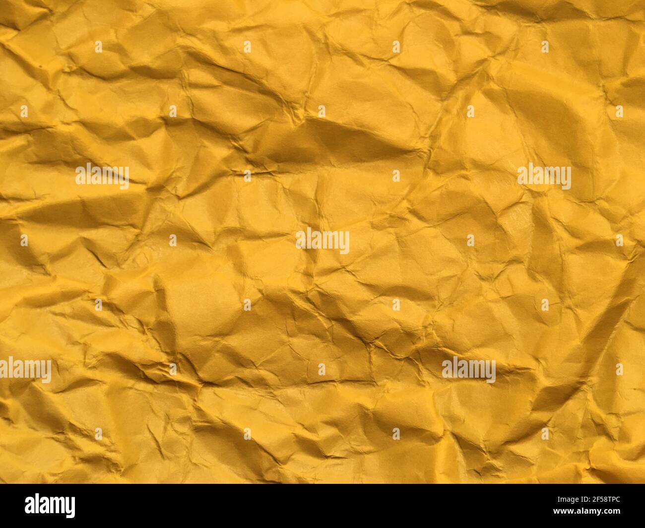 Abstract texture of yellow wrinkled paper background for Design. Copy ...
