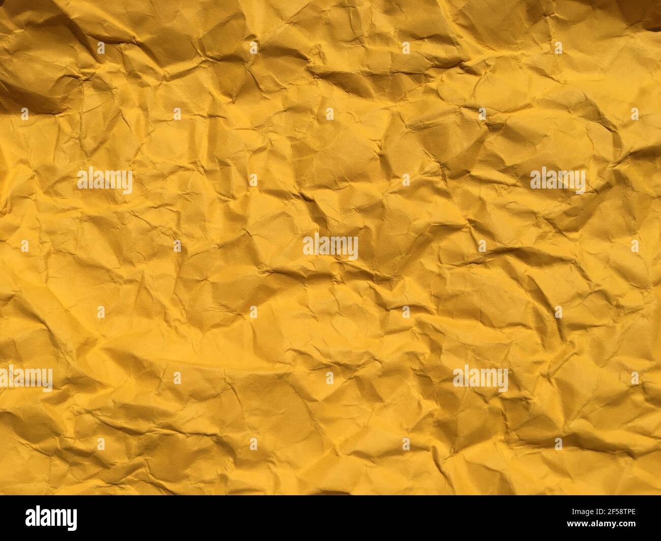 Abstract texture of yellow wrinkled paper background for Design. Copy ...
