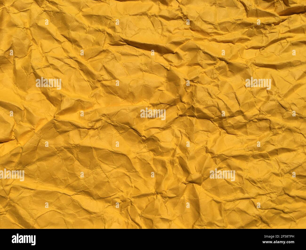 Abstract texture of yellow wrinkled paper background for Design. Copy ...