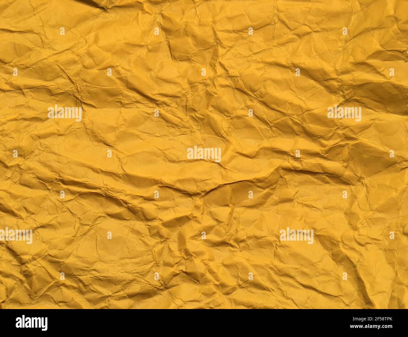 Abstract texture of yellow wrinkled paper background for Design. Copy ...