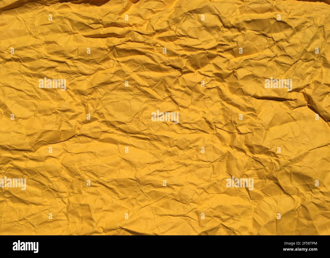 Abstract texture of yellow wrinkled paper background for Design. Copy ...