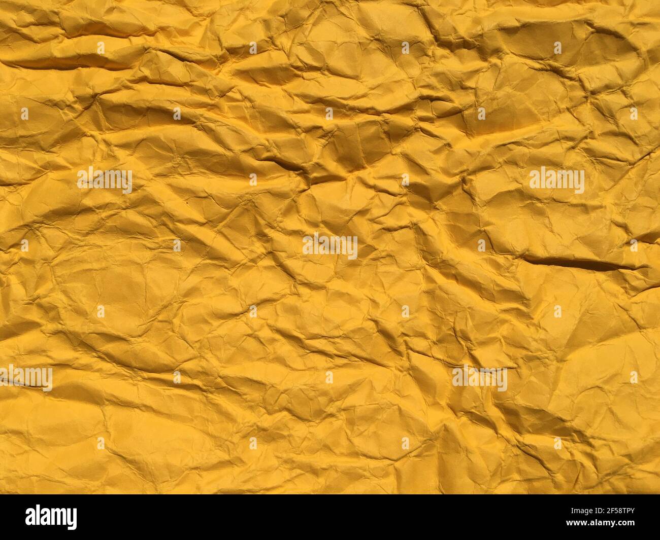 Abstract texture of yellow wrinkled paper background for Design. Copy ...