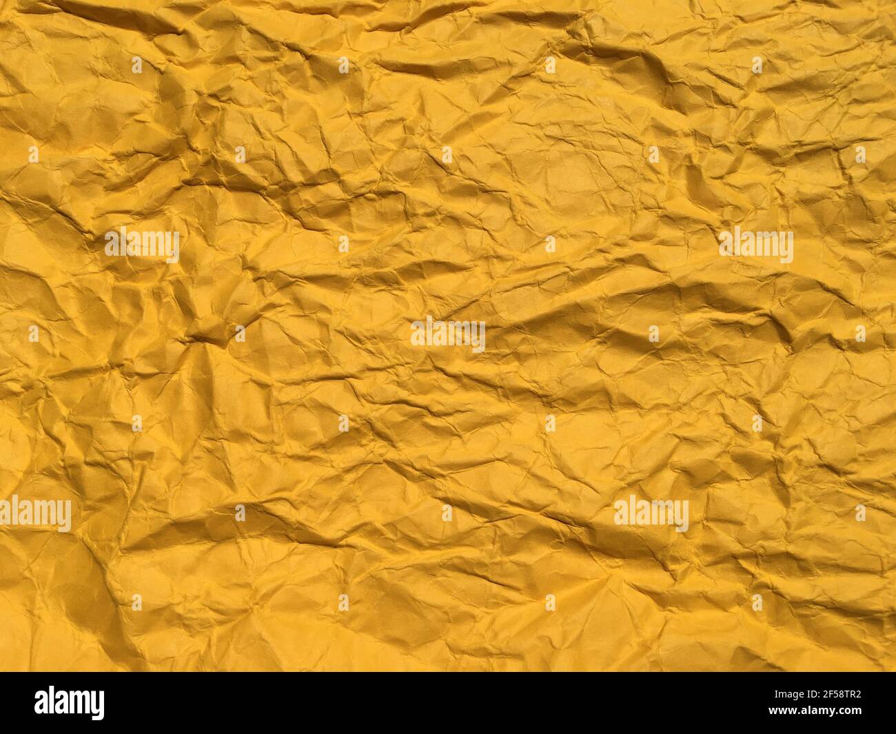 Abstract texture of yellow wrinkled paper background for Design. Copy ...