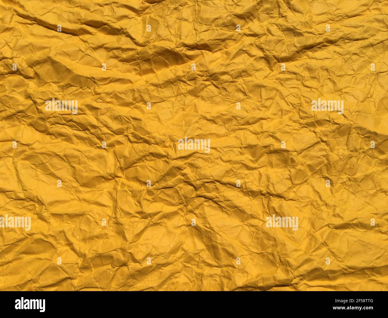 Yellow wrinkled paper background for Design. Copy space for text or ...