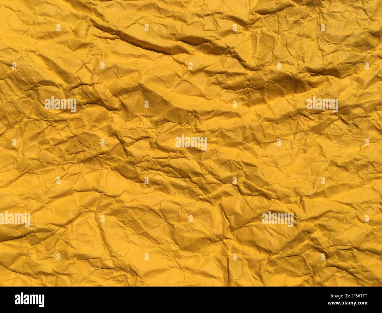 Yellow wrinkled paper background for Design. Copy space for text or ...