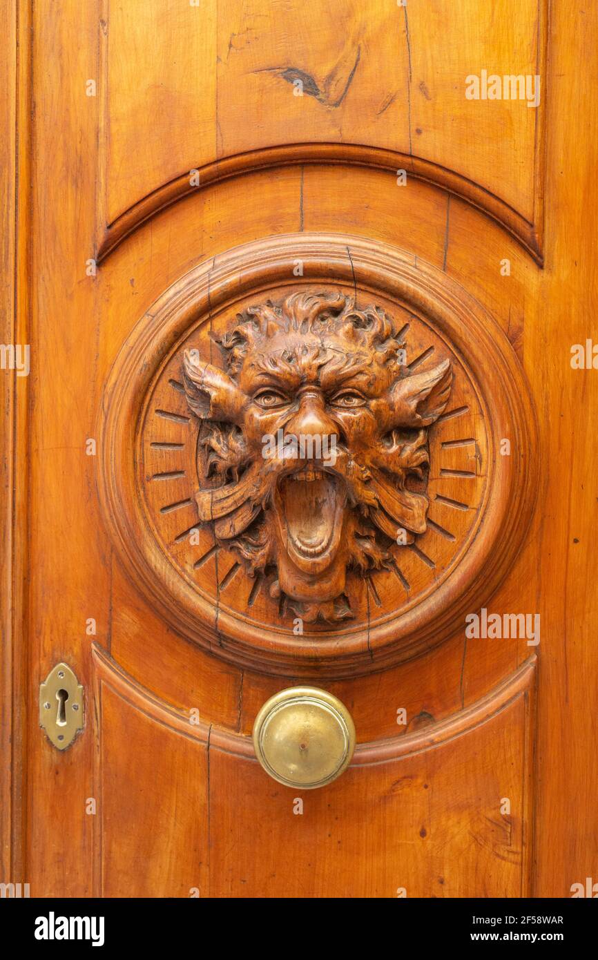 Decorative Wood Carved Door With Devil Face and Golden Door Handle ...