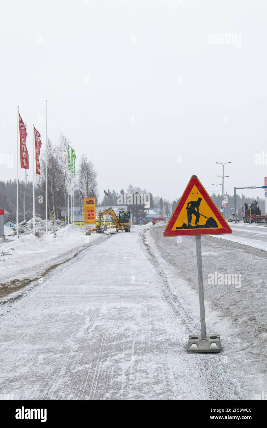 Man digging road work sign hi-res stock photography and images - Alamy