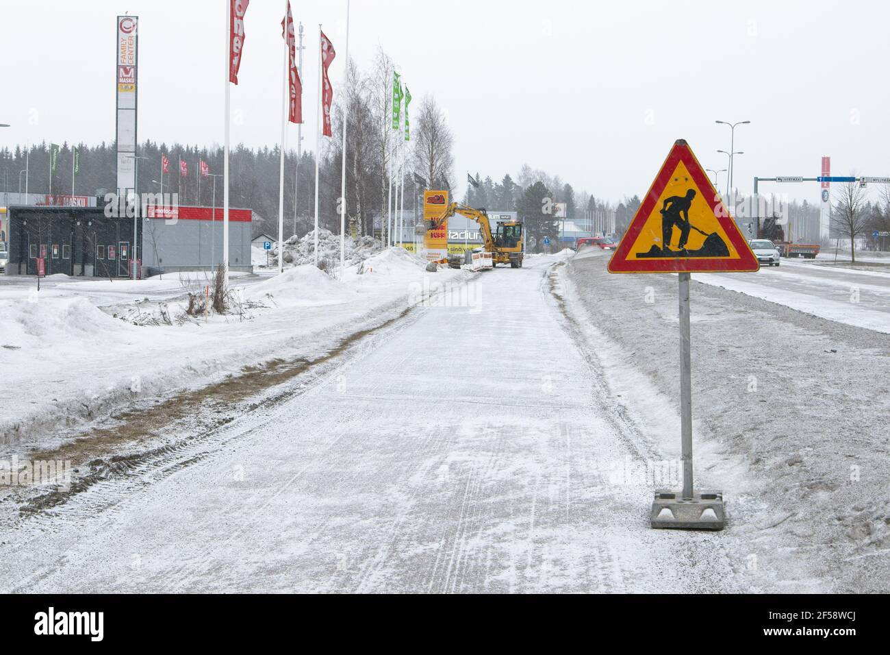 Men at work traffic sign, Finland Stock Photo - Alamy