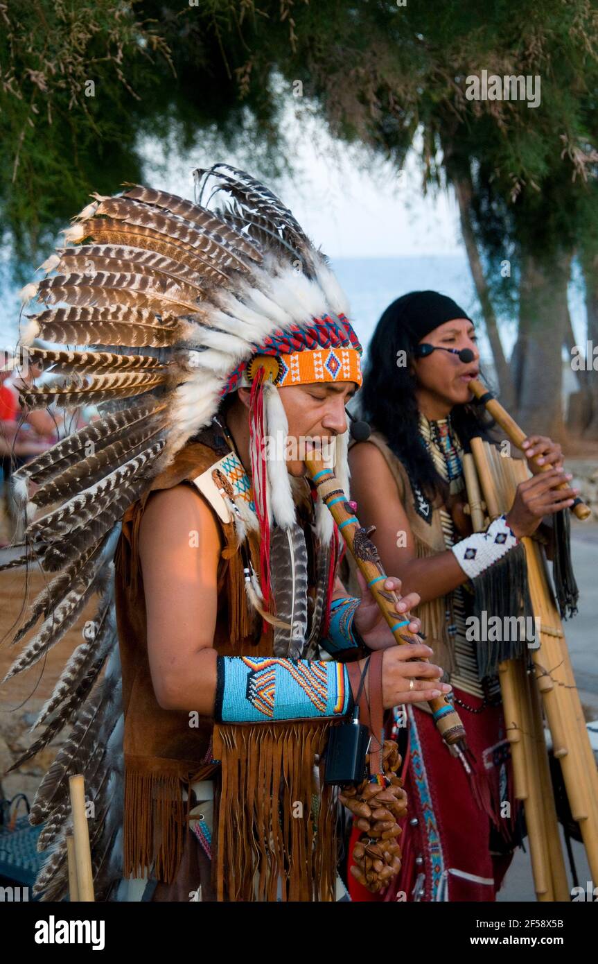 Red Indian Street Performers In Cala Bona Majorca Spain Stock Photo - Alamy