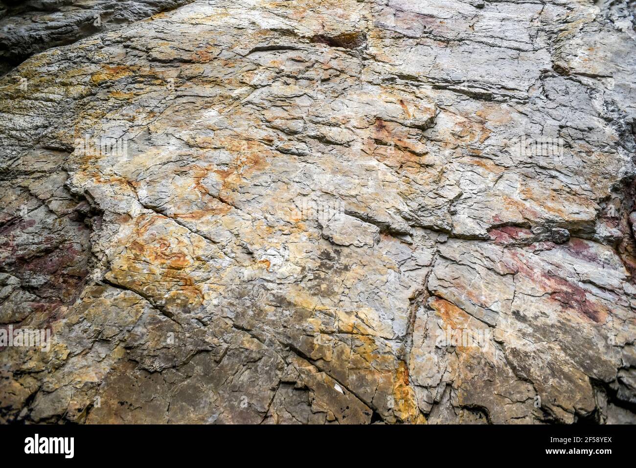 Colorful rock rock texture, geological phenomenon in the rocks above ...