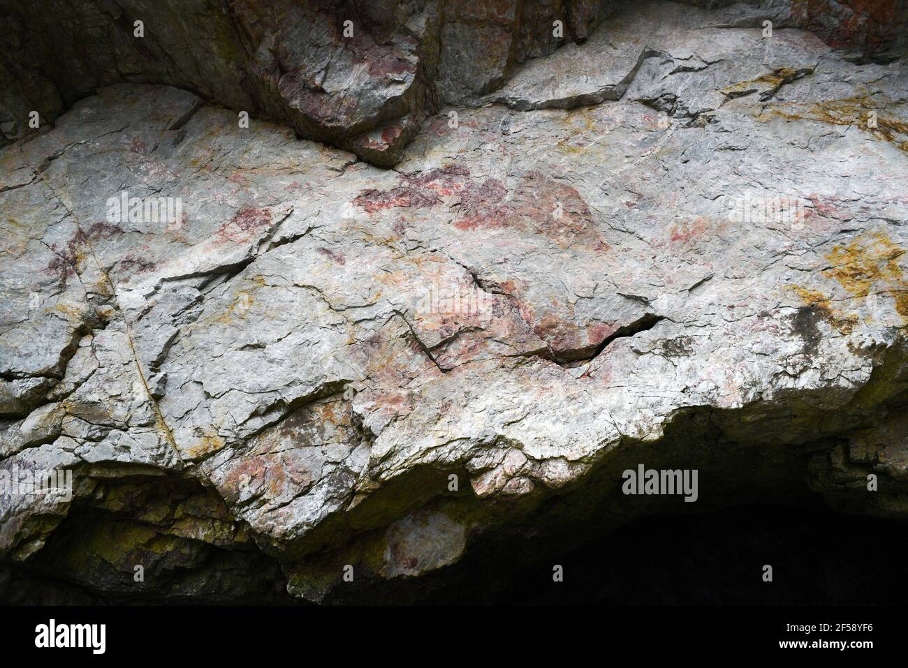 Colorful rock rock texture, geological phenomenon in the rocks above ...