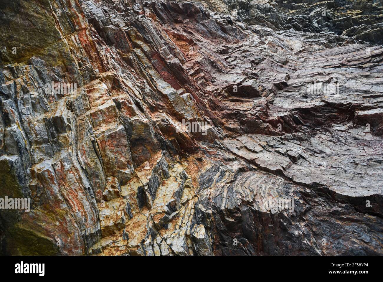 Colorful rock rock texture, geological phenomenon in the rocks above ...
