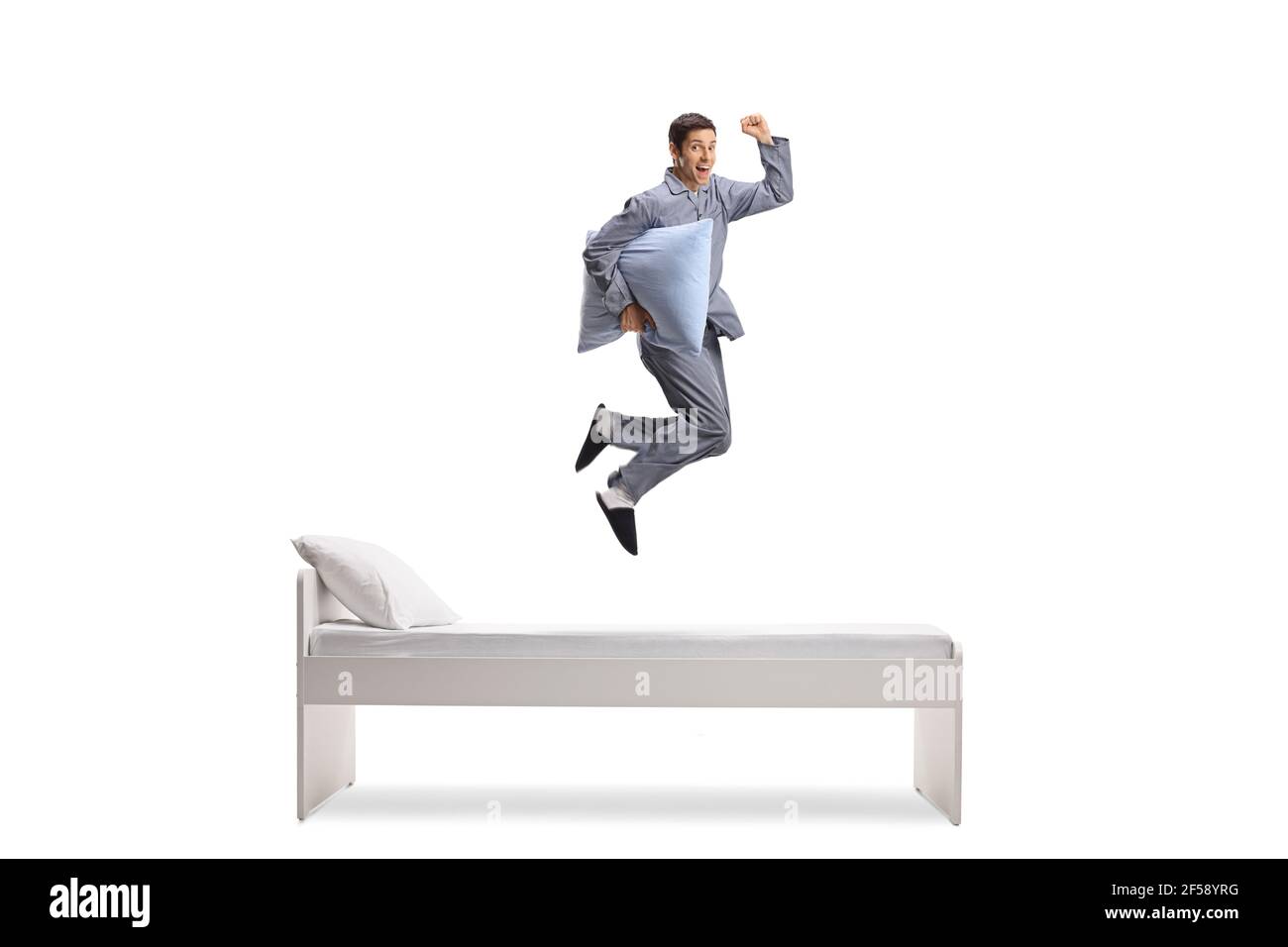 Man jumping in bed Cut Out Stock Images & Pictures - Alamy