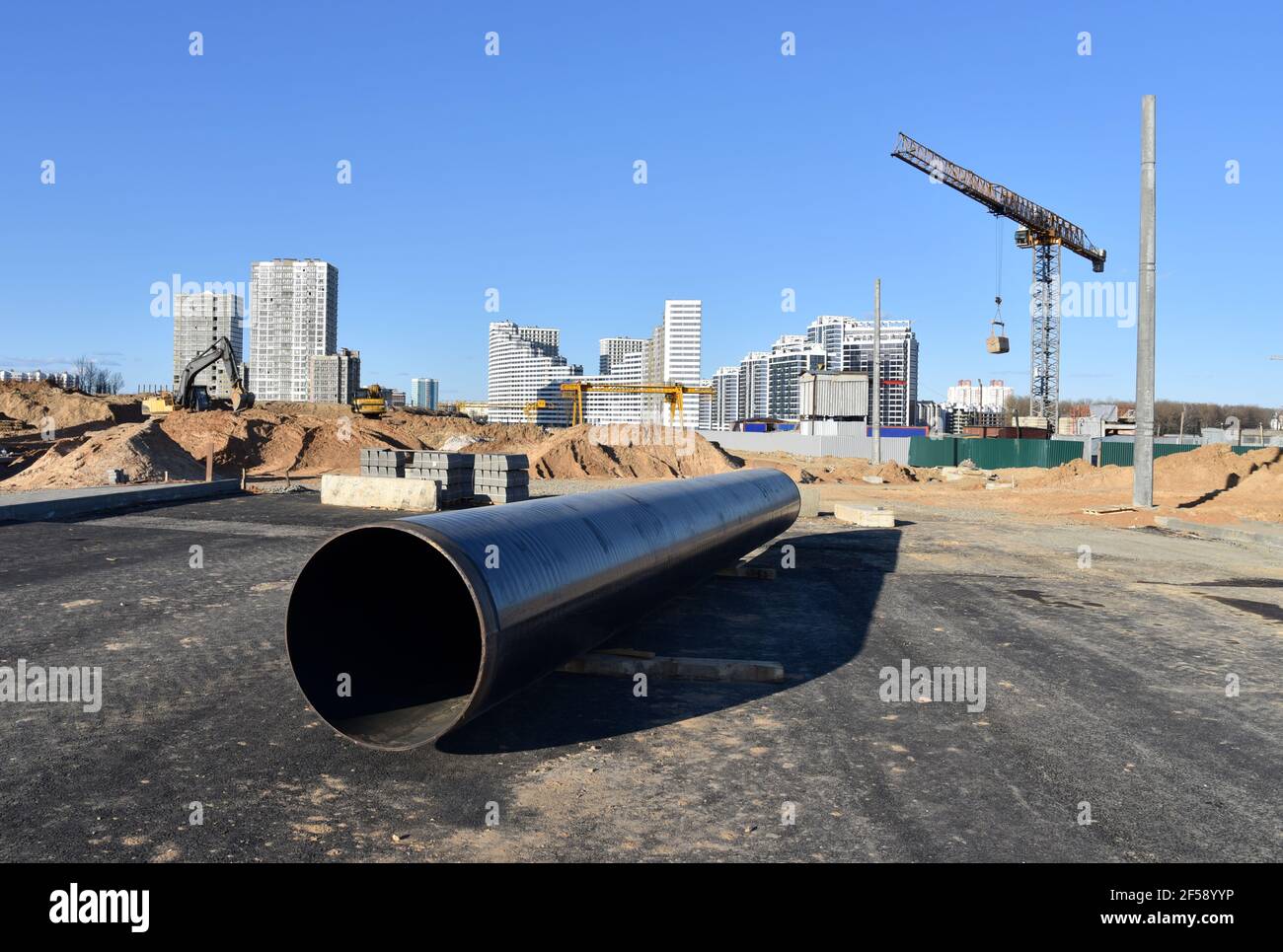 Black pipe at construction site for sewerage. Water main sanitary ...