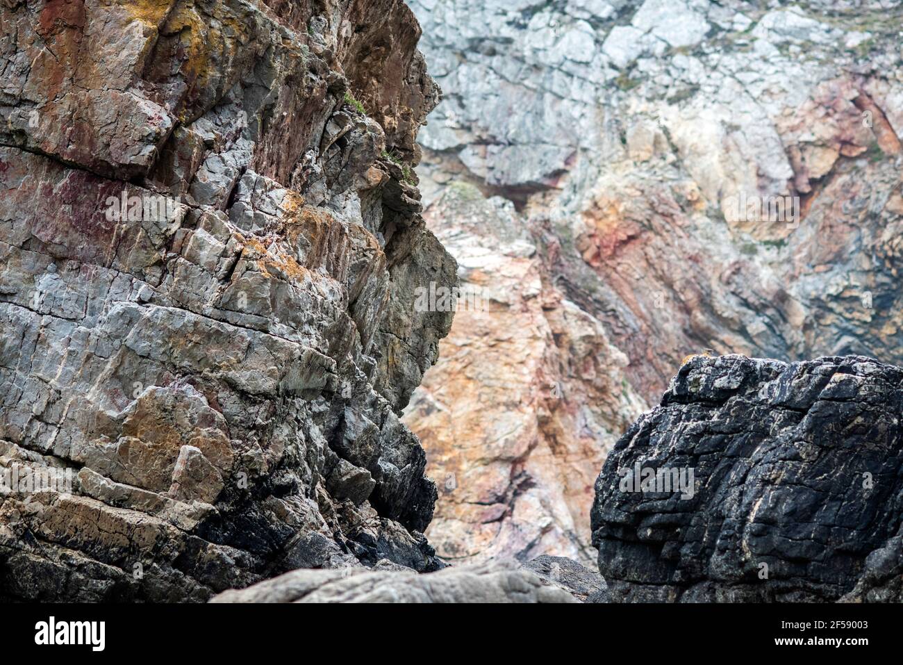 Colorful rock rock texture, geological phenomenon in the rocks above ...
