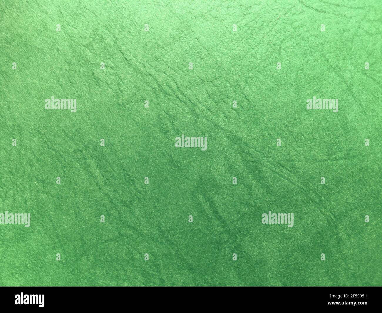 Green paper texture background with pattern for design. Copy space for ...