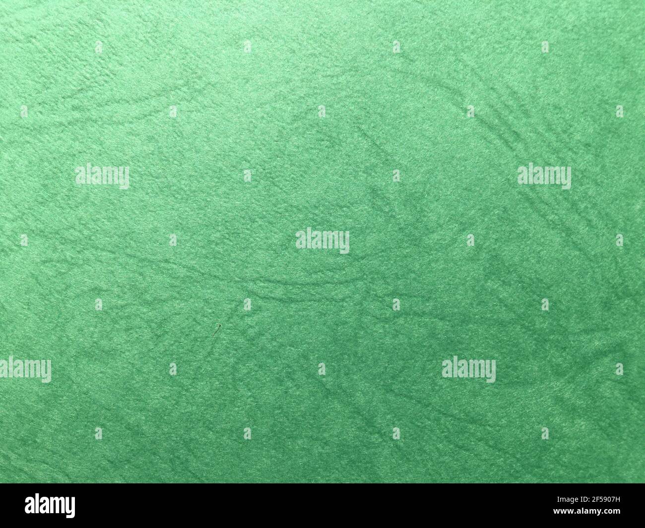 Green paper texture background with pattern for design. Copy space for ...