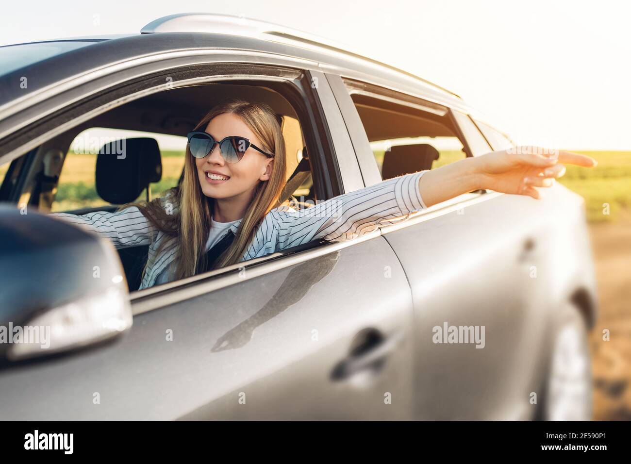 Female car front seat passenger hi-res stock photography and images - Alamy