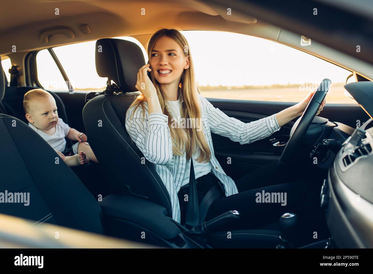Mother baby driving in car hi-res stock photography and images - Alamy