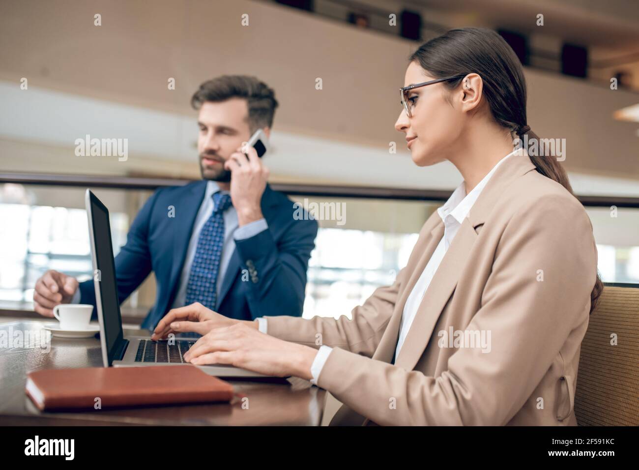 Business partners working together on a project in the office Stock ...