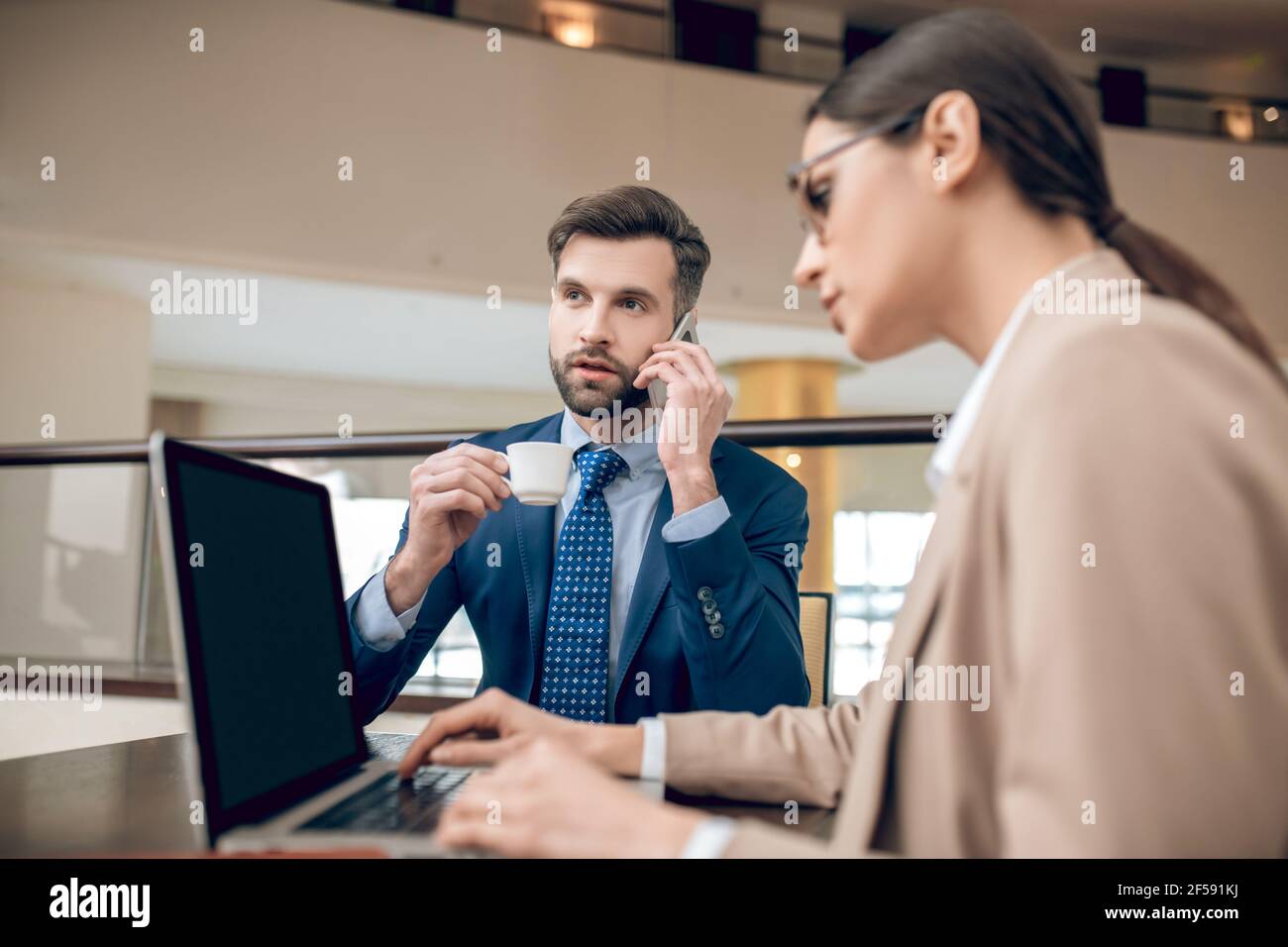 Business partners working together on a project in the office Stock ...